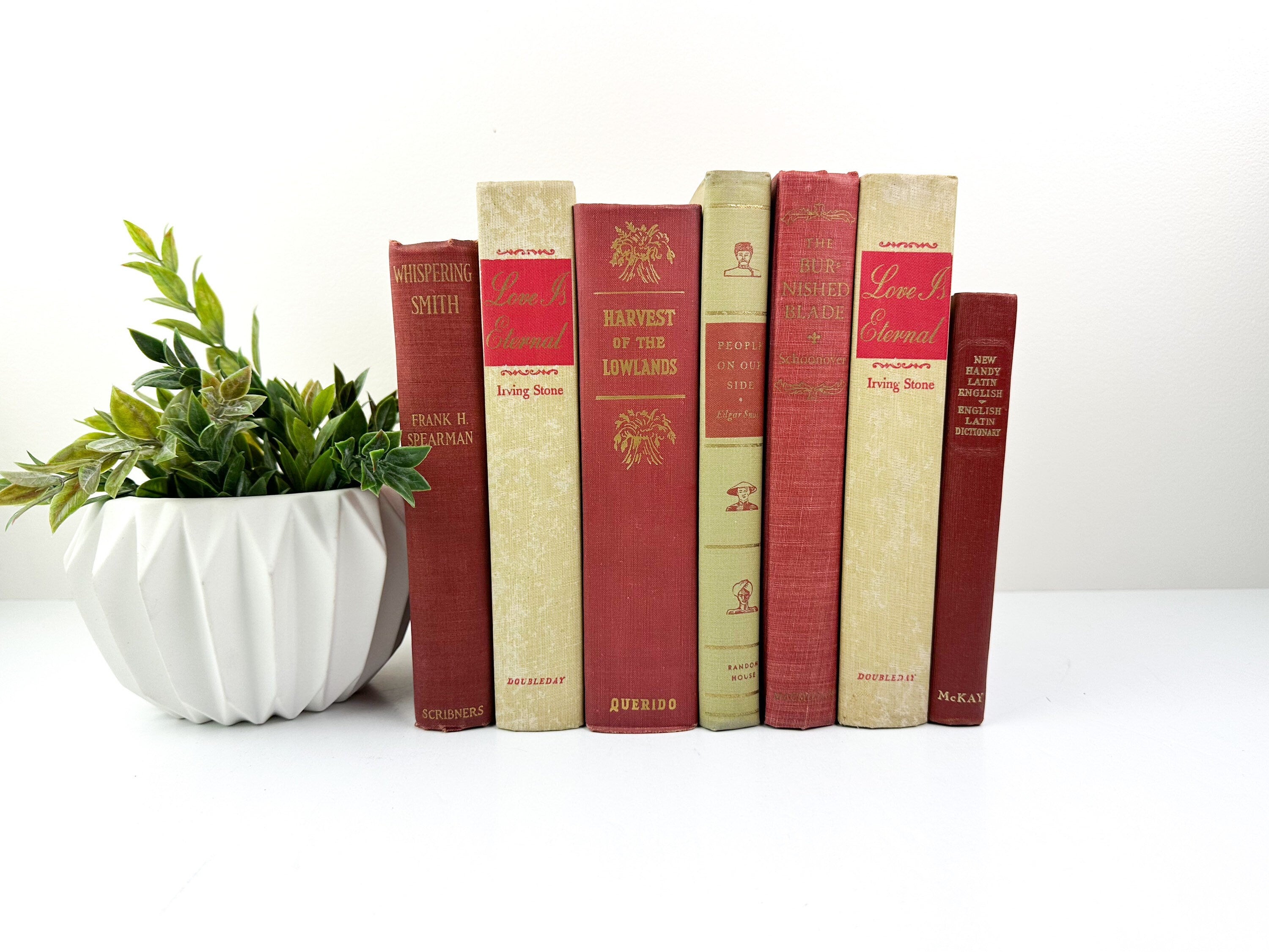Red and Cream Stack of Books – Elements