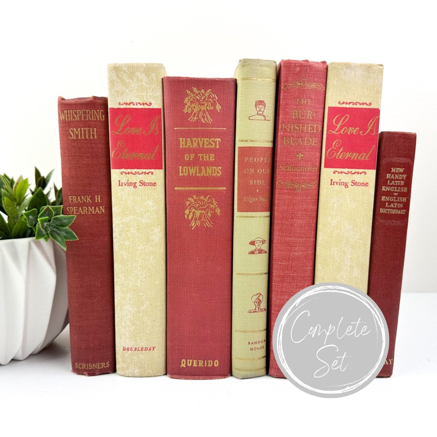 Red and Cream Stack of Books – Elements